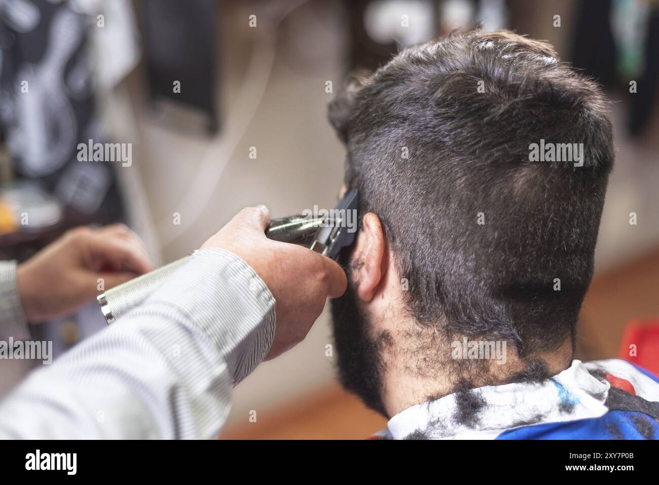 Handsome guy getting haircut hi-res stock photography and images - Alamy