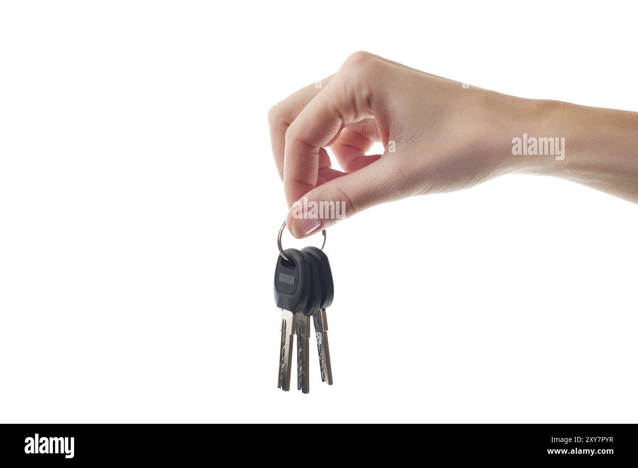 Realtor female hand holding door key to new house or flat isolated on ...