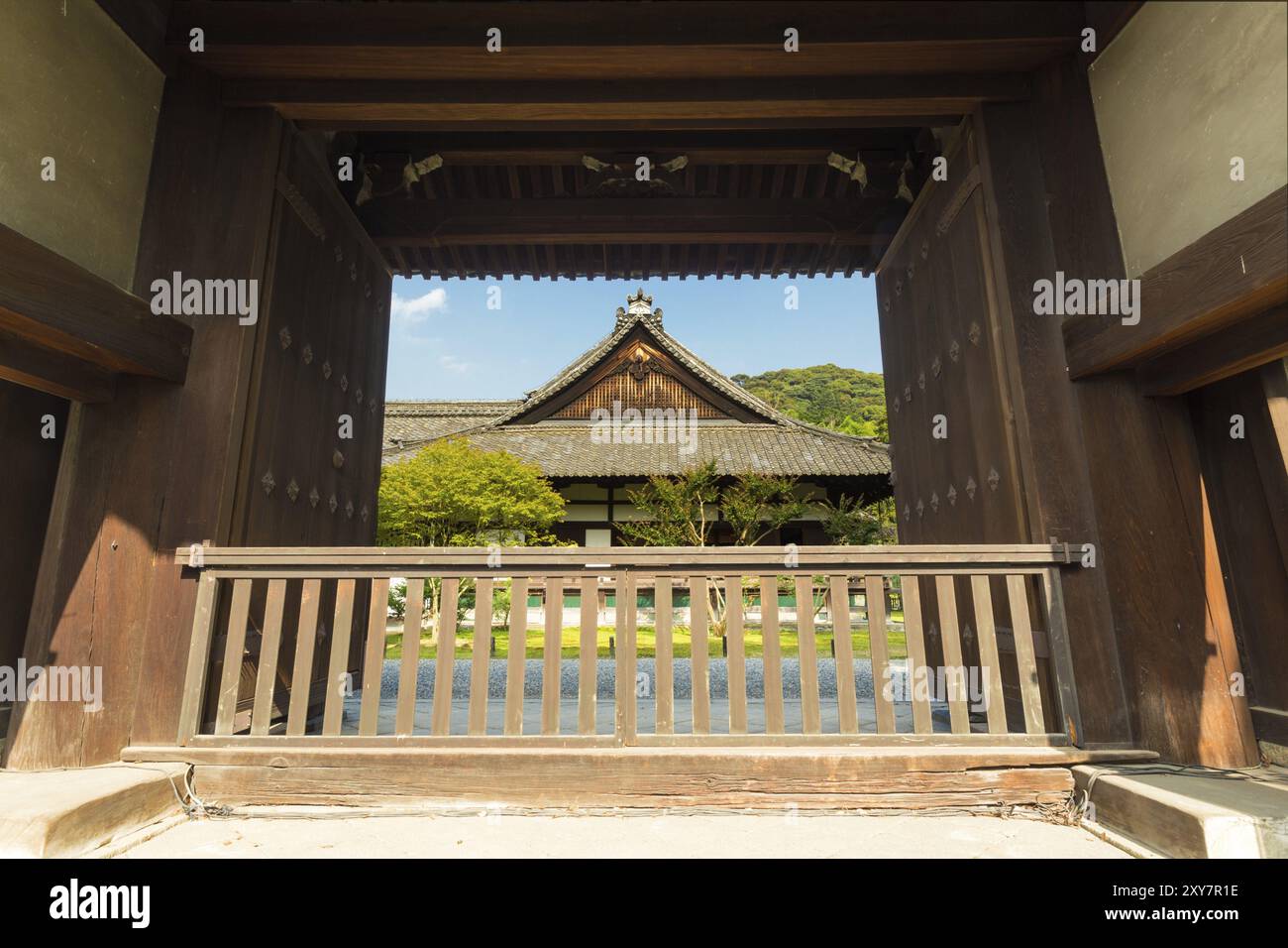 A large main gate front entrance frames the centered exterior of ...