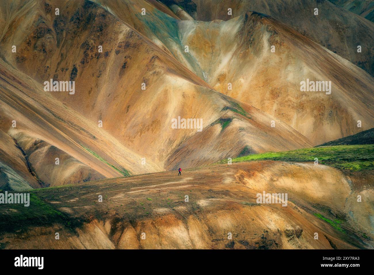 Lone hiker in the vast Landmannalaugar area in Icelandic Highlands ...