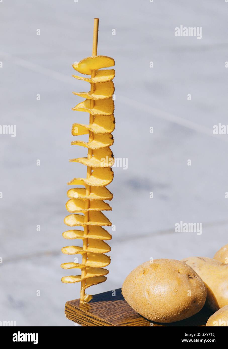 Peeled and cut potato in a as raw vegetables backgrounds Stock Photo ...