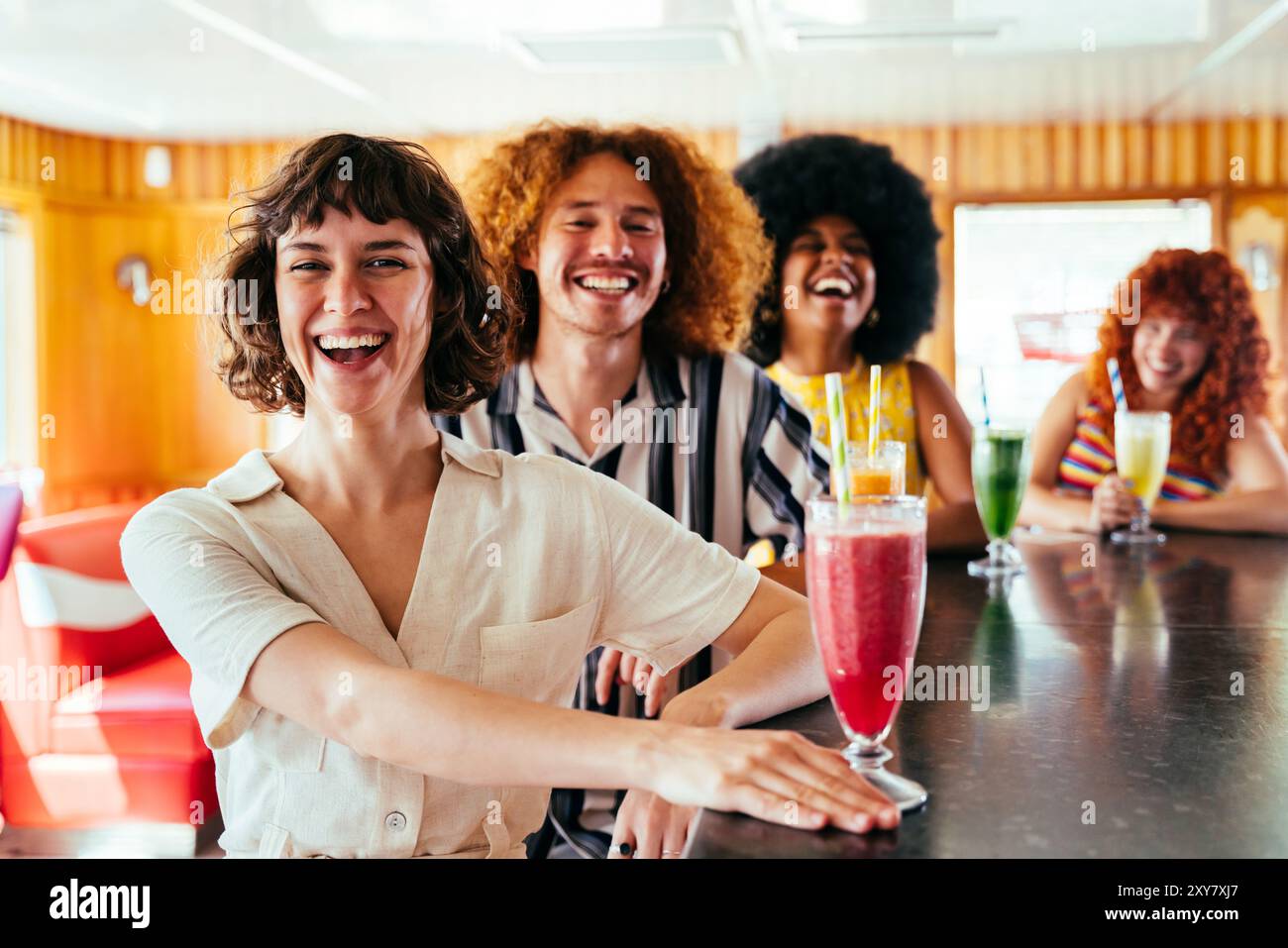 Group friends drinking milkshakes hi-res stock photography and images ...