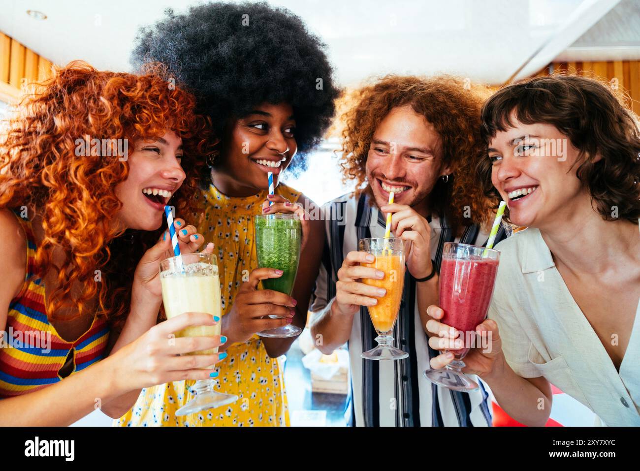 Group friends drinking milkshakes hi-res stock photography and images ...