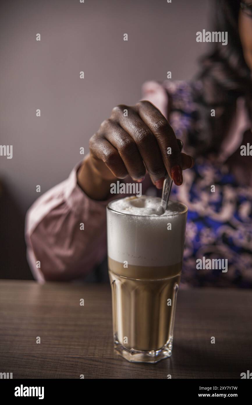 Woman stirs hi-res stock photography and images - Alamy
