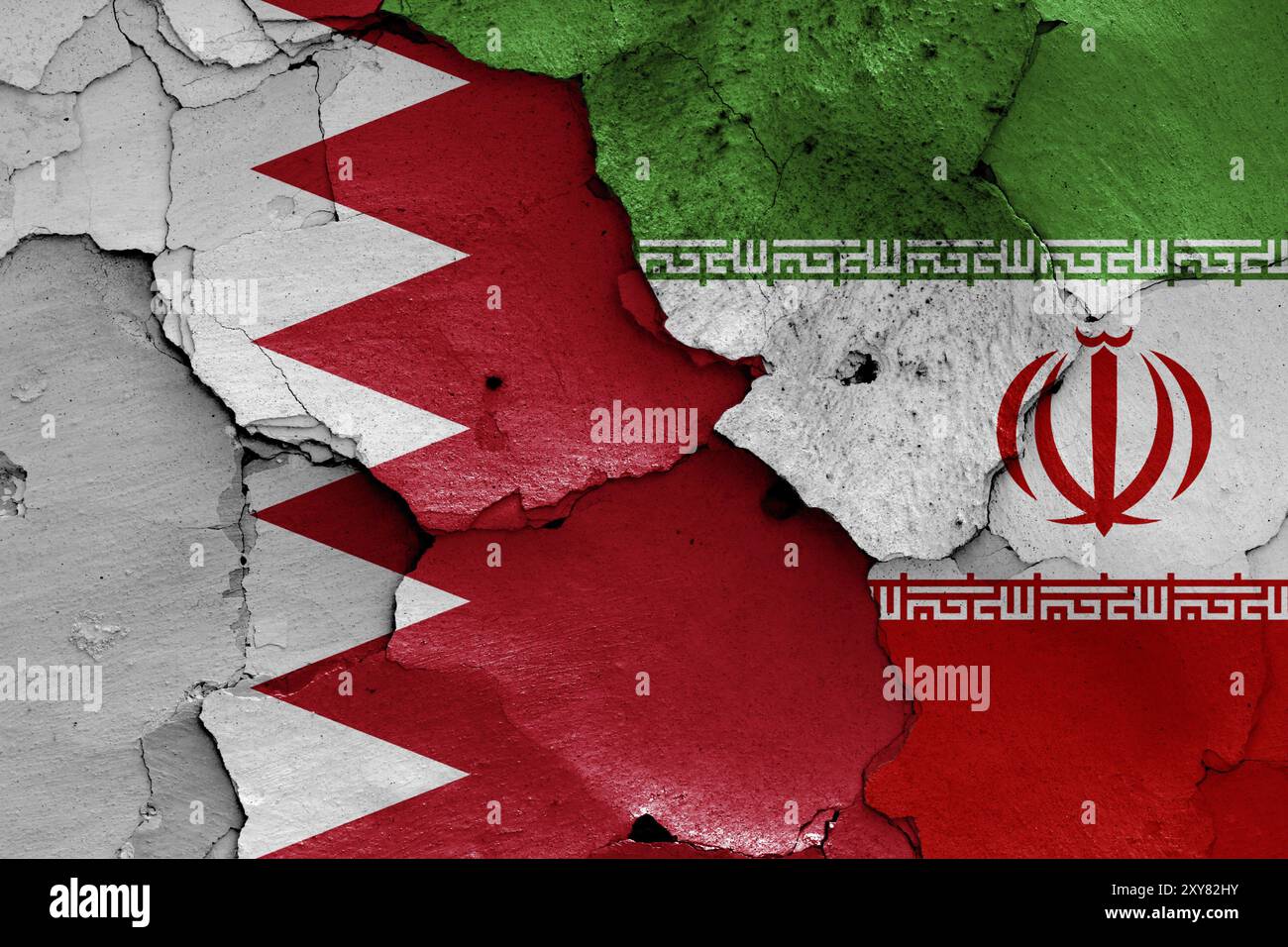 Flags of Bahrain and Iran painted on cracked wall Stock Photo - Alamy
