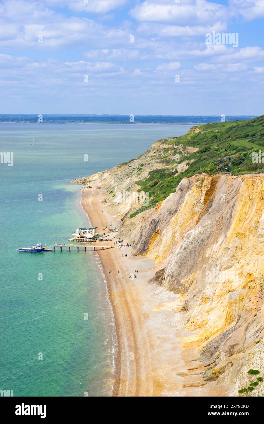Isle of Wight UK - Alum Bay people on the beach and multi-coloured sand ...