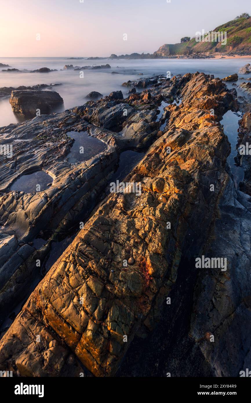 coastal seascape with rocks and ocean water at minnie water on nsw ...