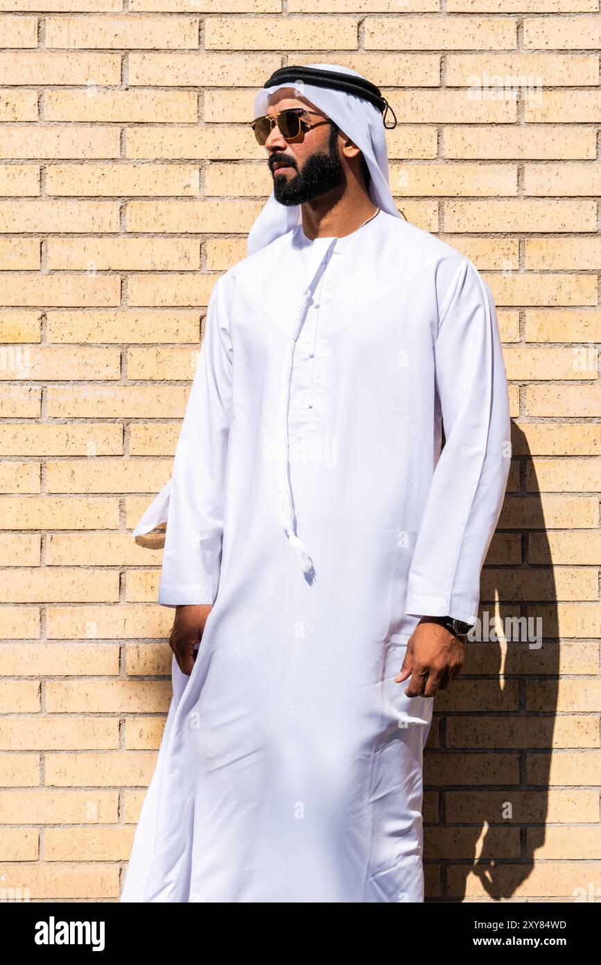 Portrait of handsome arab businessman wearing traditional emirati ...