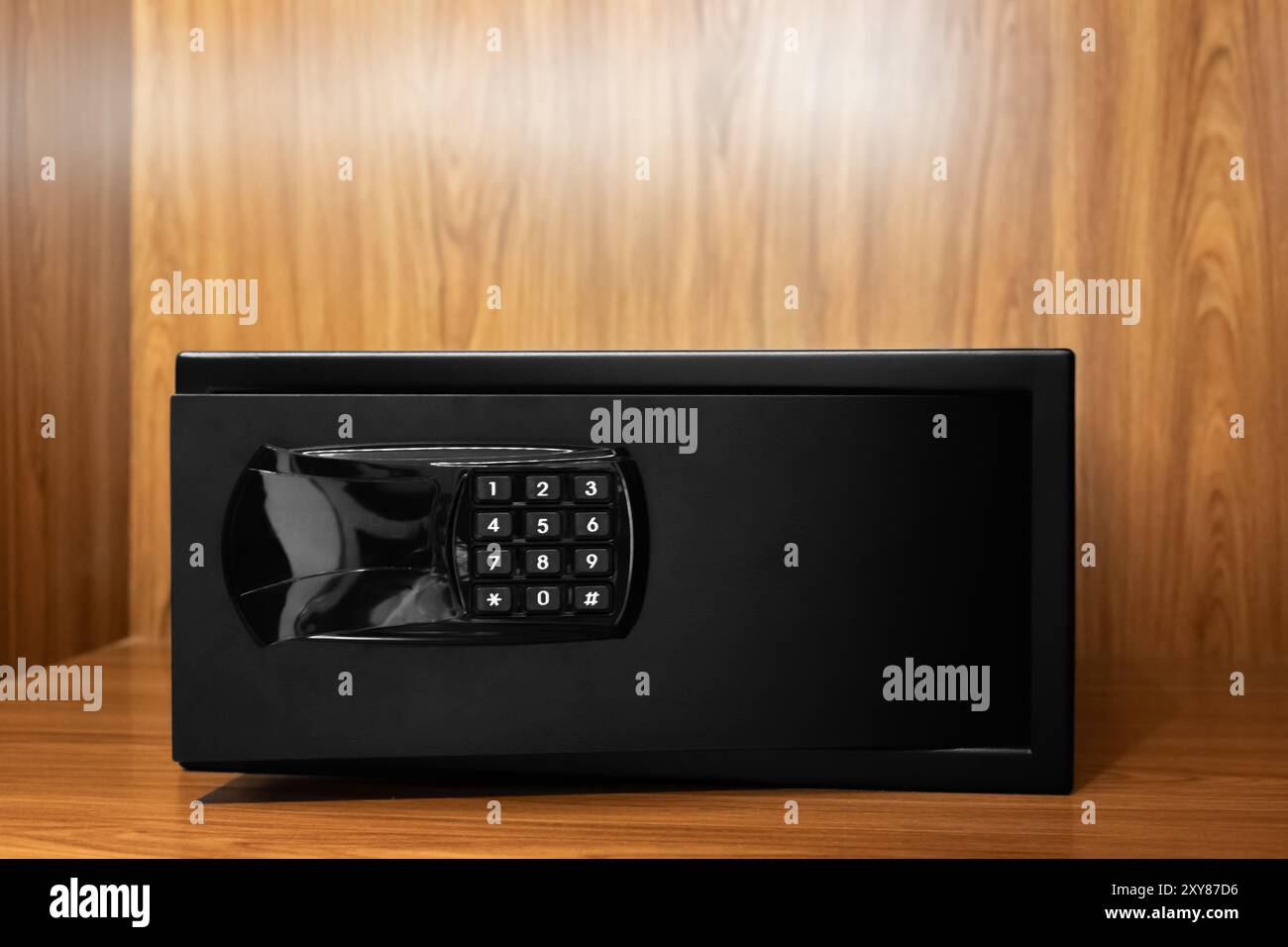 Safe lock code on safety box bank Protection. Small black metal safe ...