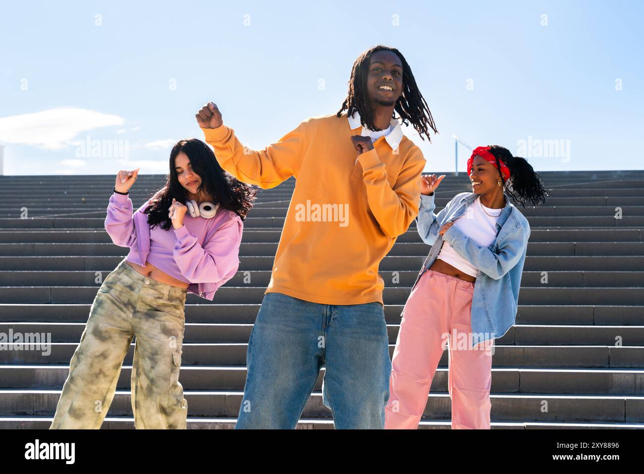 Young group of multiethnic hip-hop dancers wearing colorful urban ...