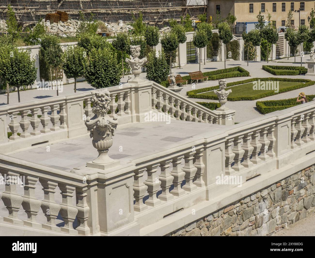 Stone terrace with ornate decorations and well-tended open-air gardens ...