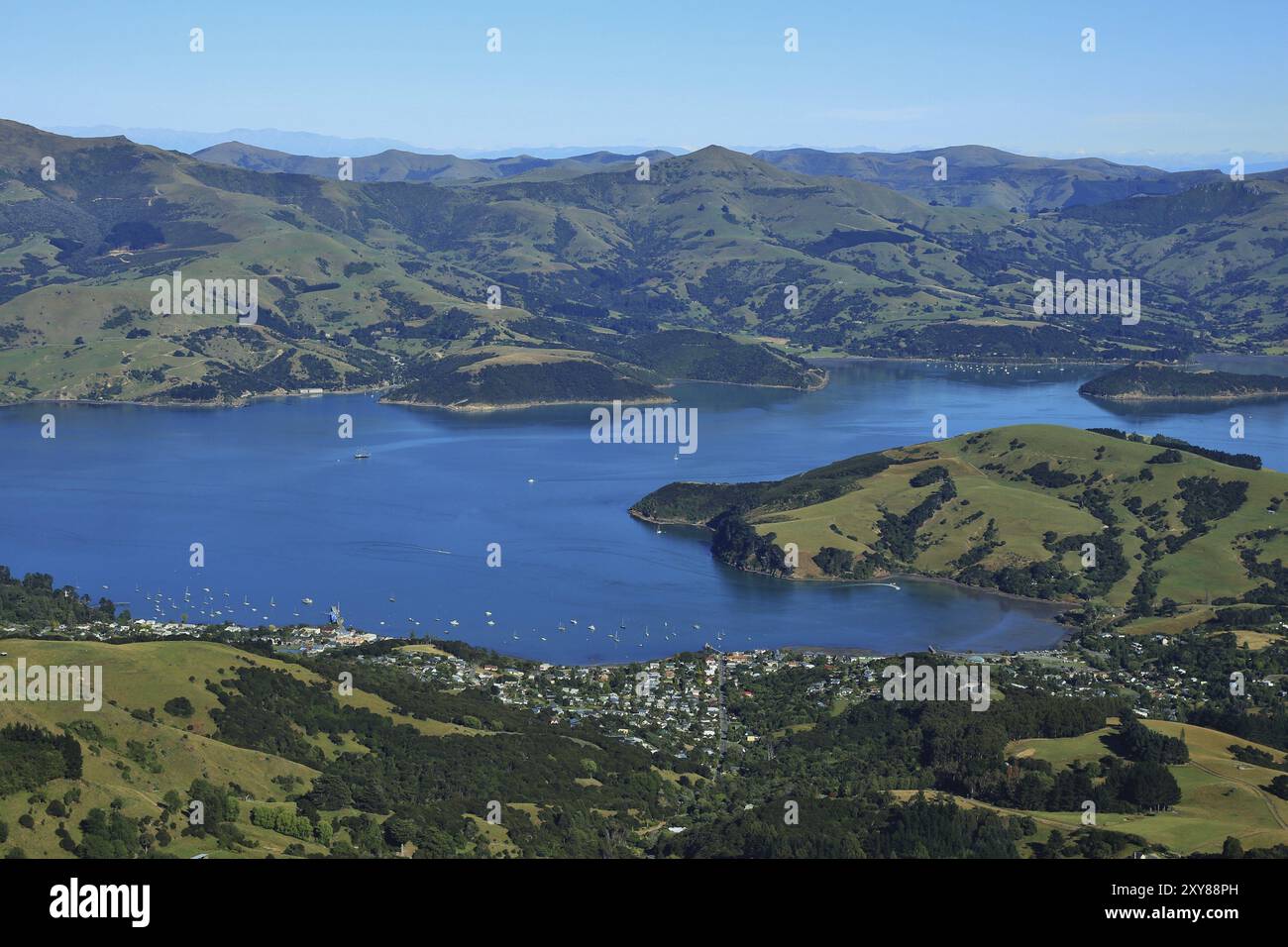 Akaroa Harbour and mountains. Landscape on the Banks Peninsula, New ...