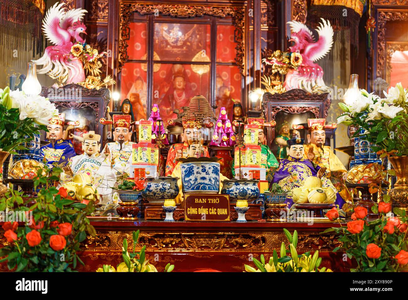 Close up of gifts and decoration inside a shrine in a folk religion ...
