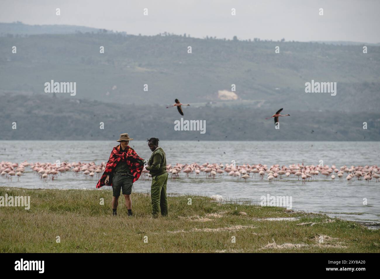 (240828) -- NAIROBI, Aug. 28, 2024 (Xinhua) -- Zhuo Qiang and a ranger ...