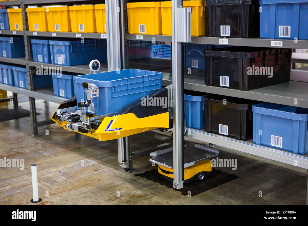 Autonomous robot picking materials from multi-layer rack in modern ...