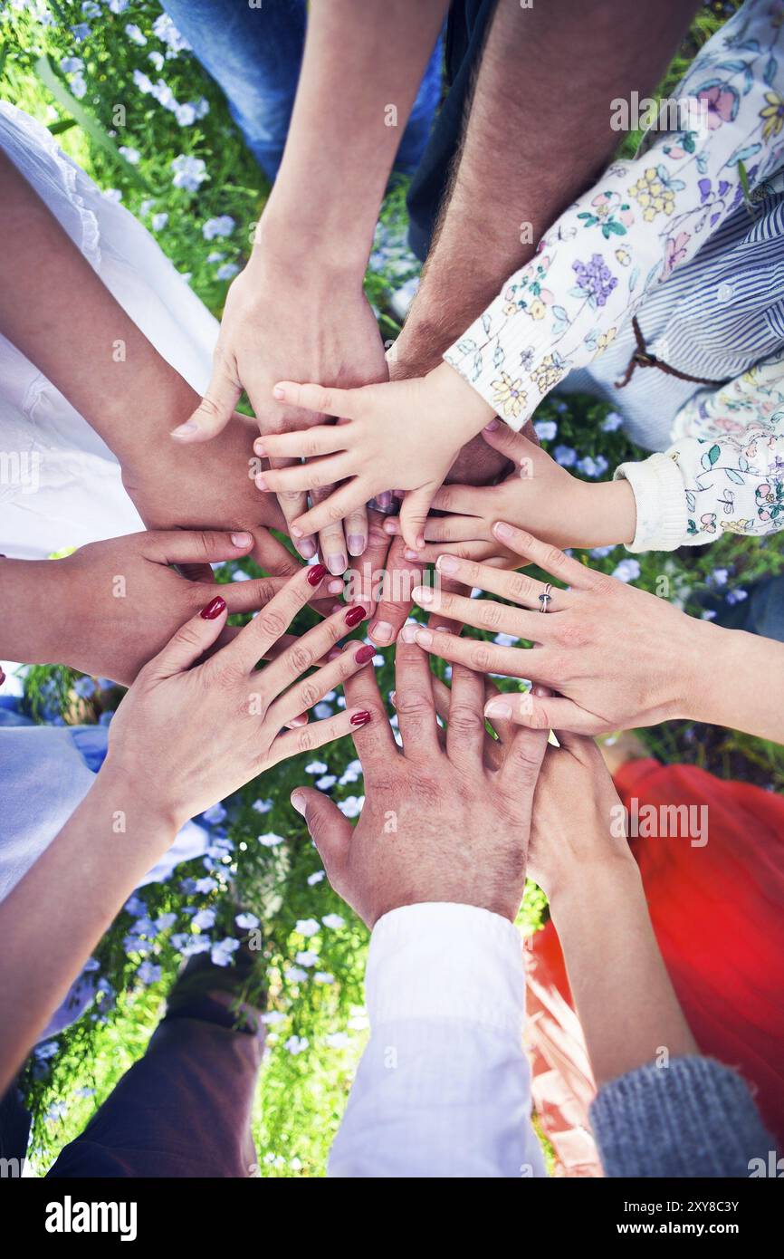 Group of friends with their hands in a complete circle. Friendship ...