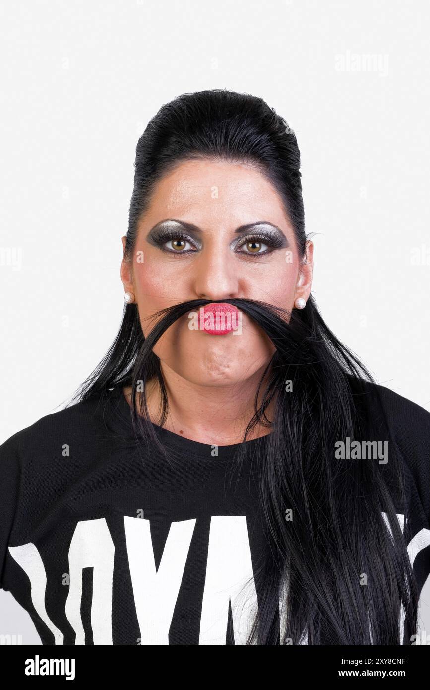 Young woman makes a moustache with her hair Stock Photo - Alamy