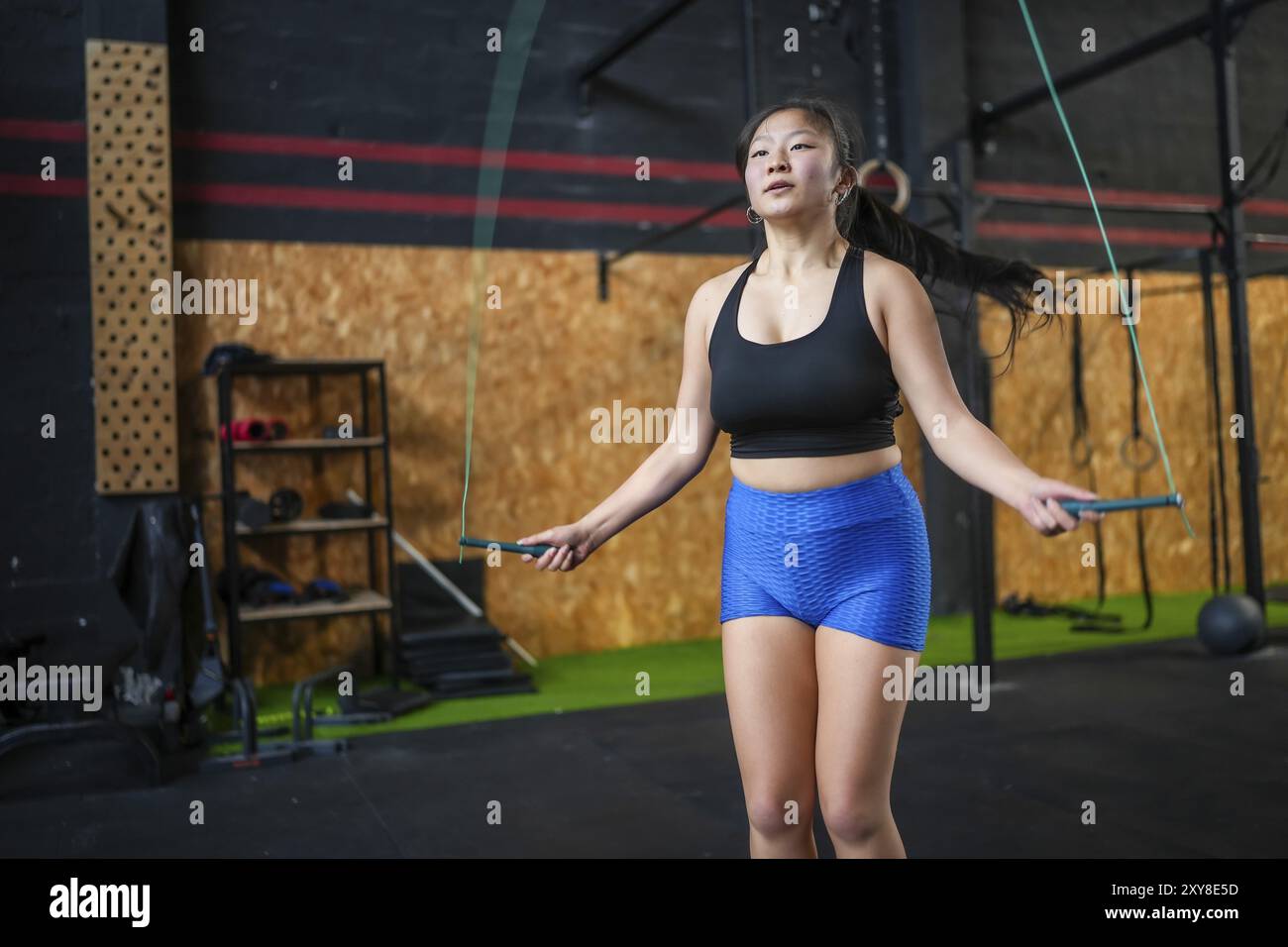 Asian strong woman jumping hi-res stock photography and images - Alamy