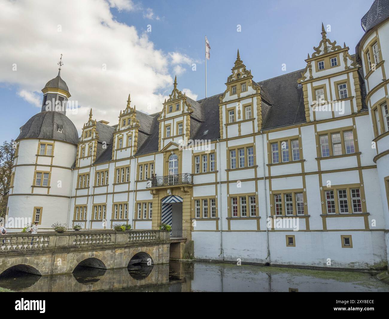 Historic Renaissance castle with imposing tower, many windows and a ...