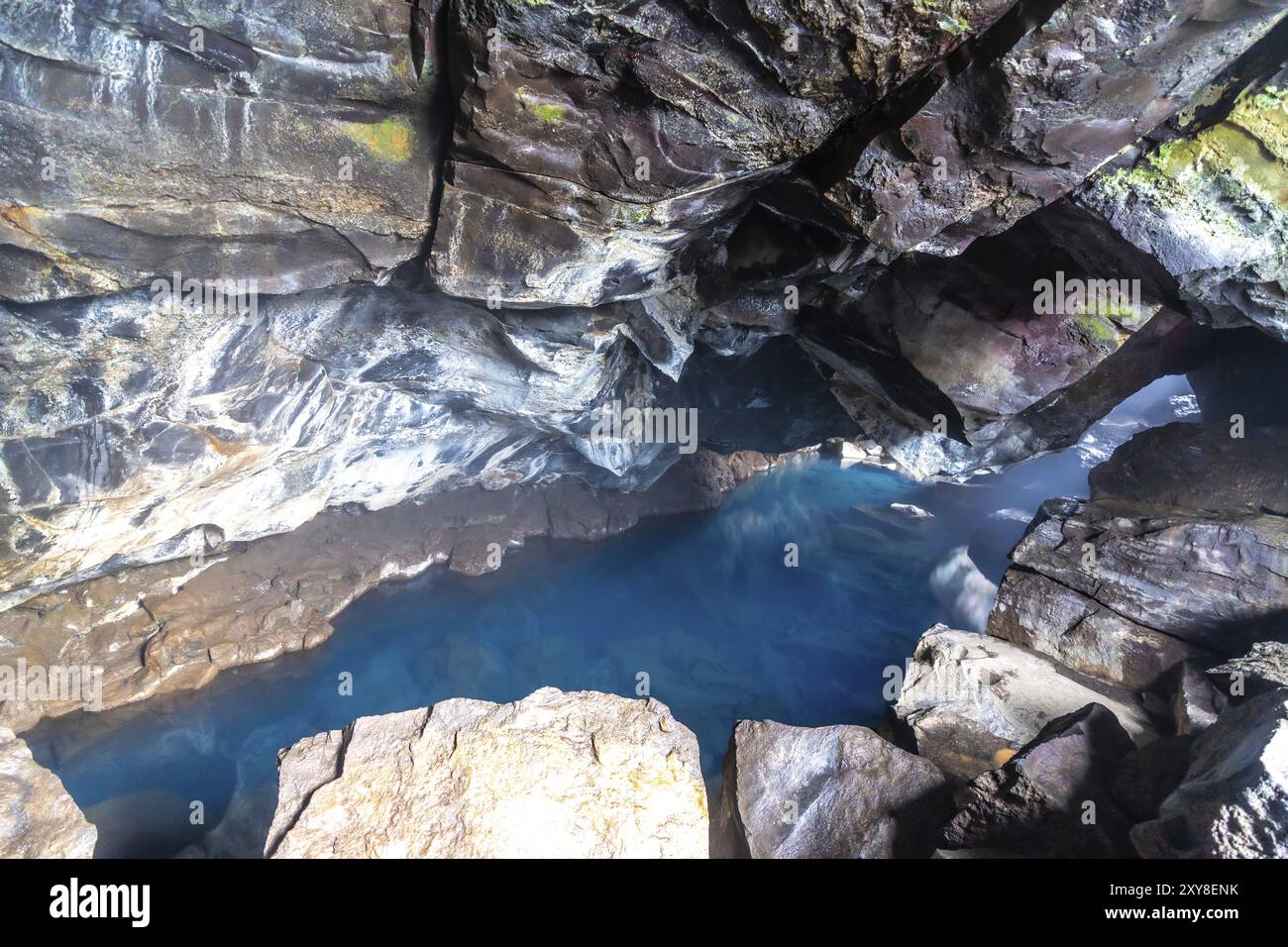 Grjotagja volcanic cave with incredibly blue and very hot hot springs ...
