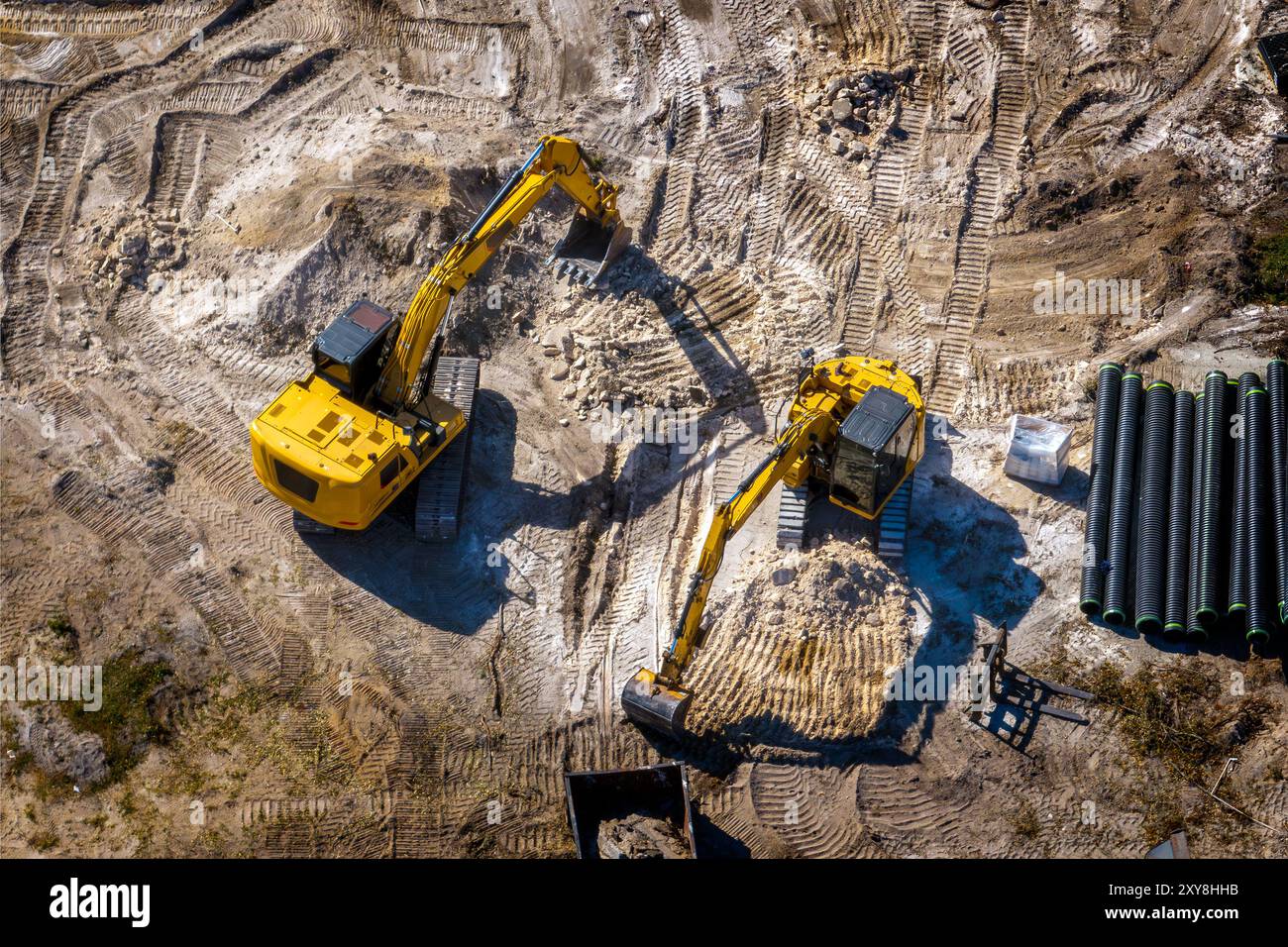 Aerial view two excavators working hi-res stock photography and images ...