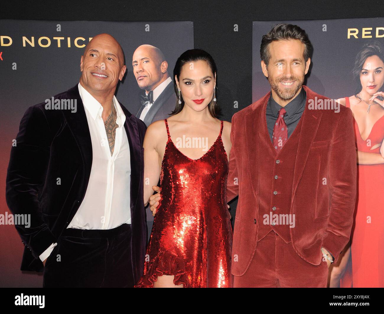 Dwayne Johnson, Gal Gadot and Ryan Reynolds at the World Premiere of ...