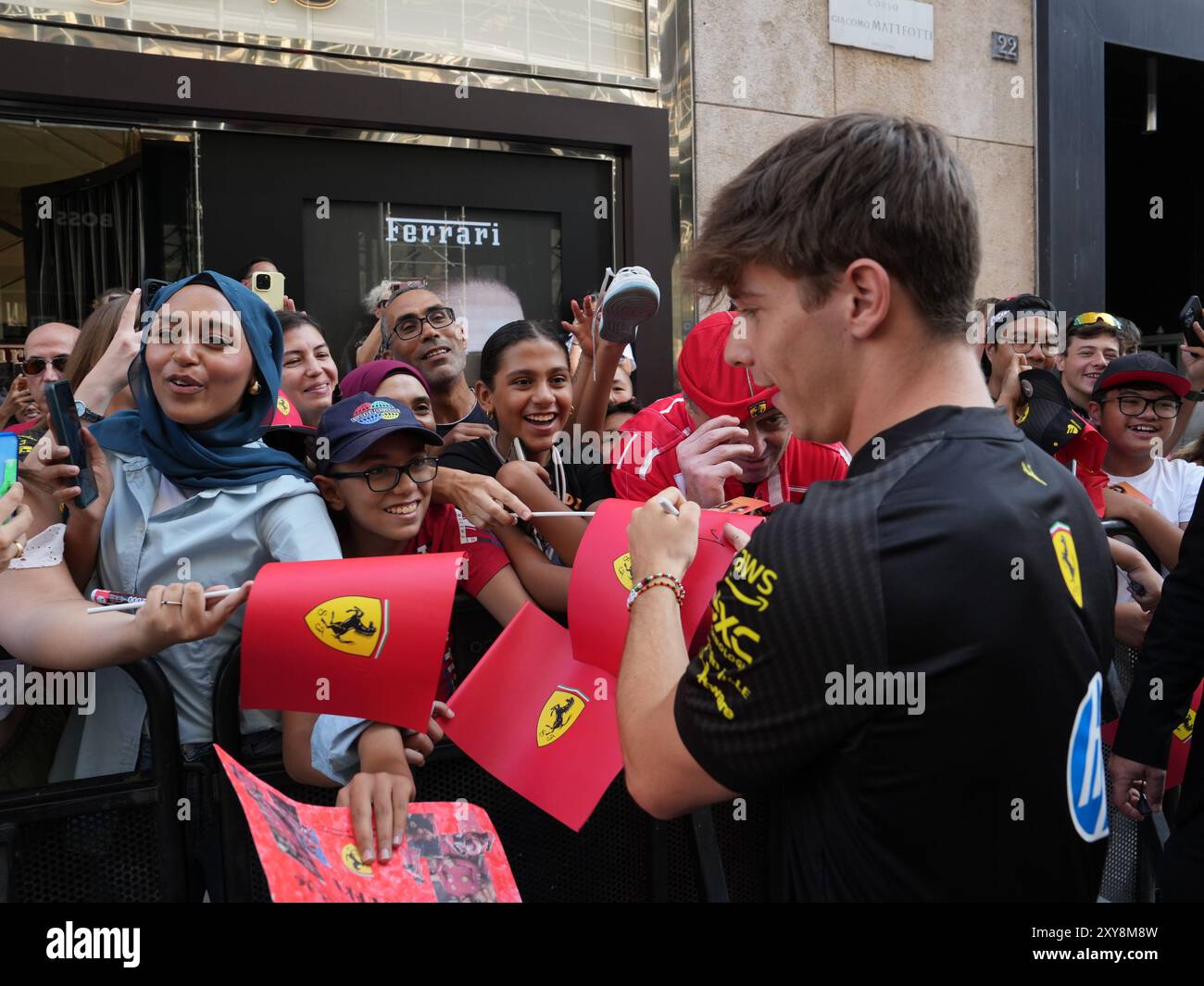 Milan - Ferrari fans storm the arrival of drivers Charles Leclerc and ...