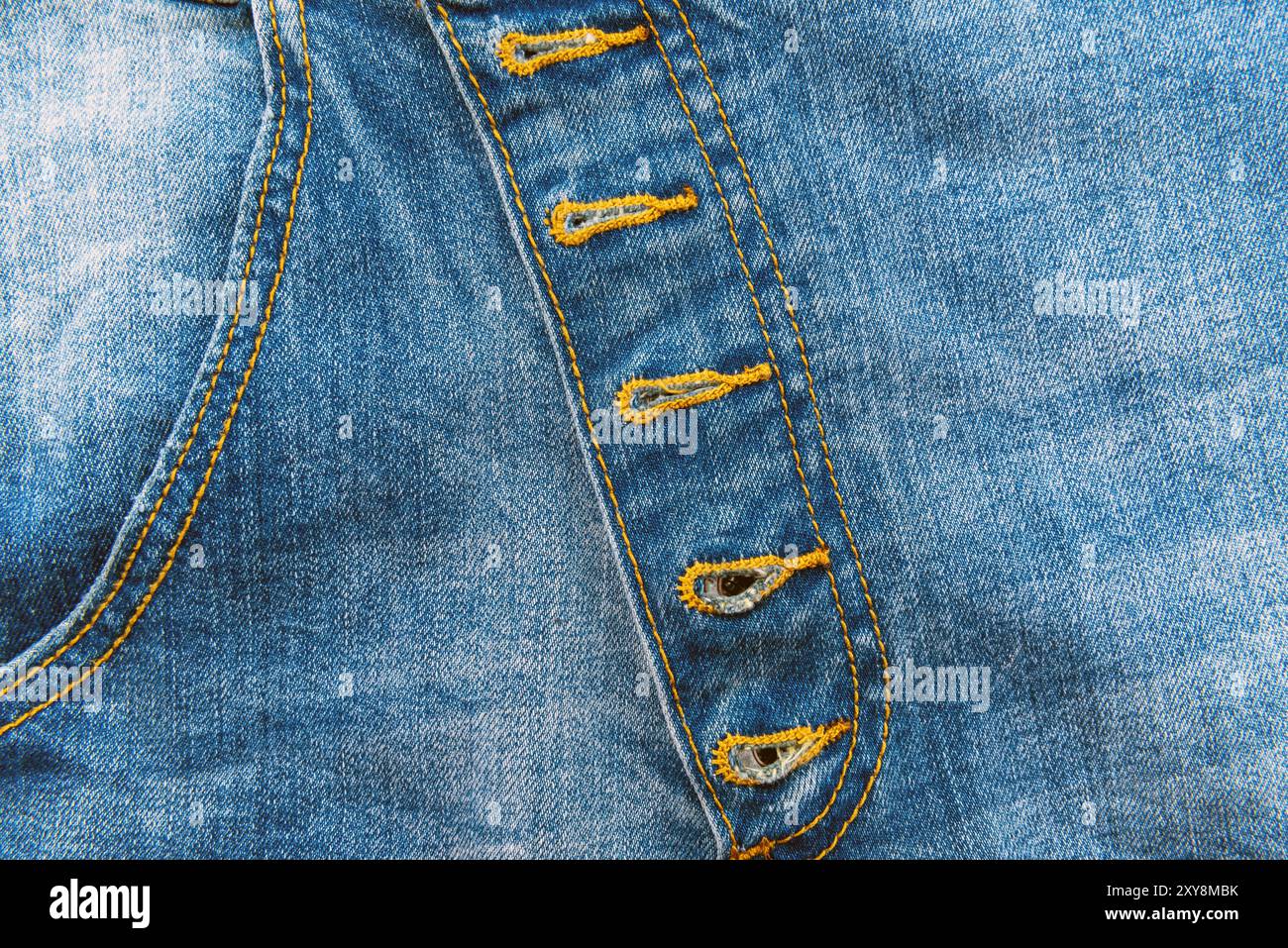Jeans texture with seams close-up. Denim background. Seam Stock Photo ...