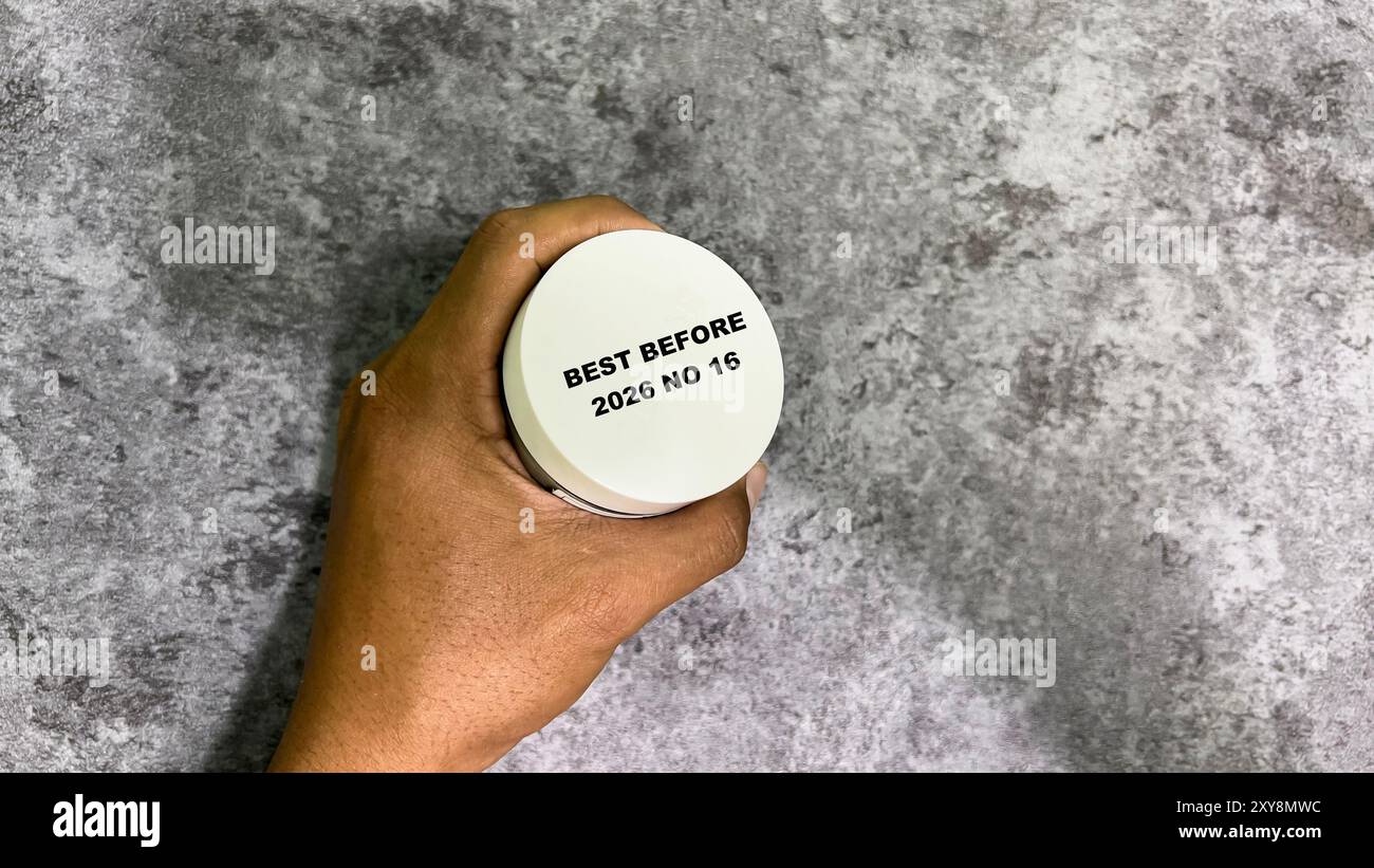 Close up text best before date on bottle cap food Stock Photo - Alamy