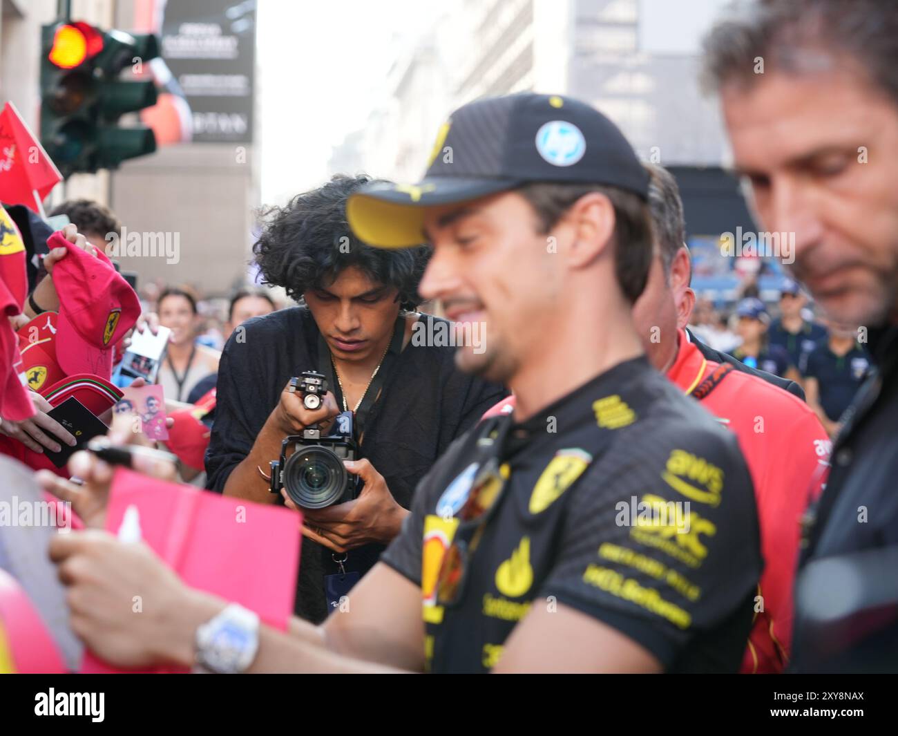 Milan - Ferrari fans storm the arrival of drivers Charles Leclerc and ...