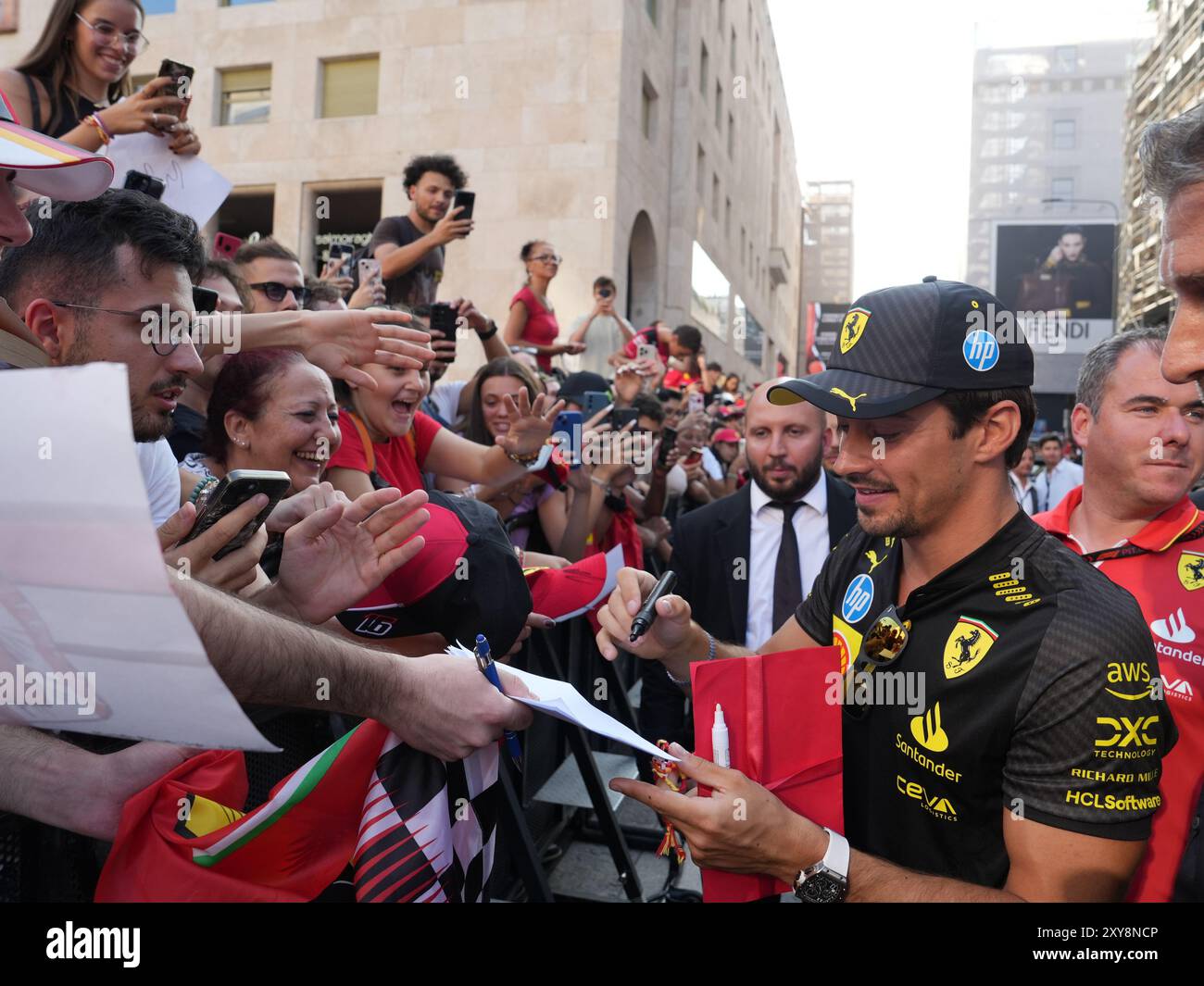 Milan - Ferrari fans storm the arrival of drivers Charles Leclerc and ...