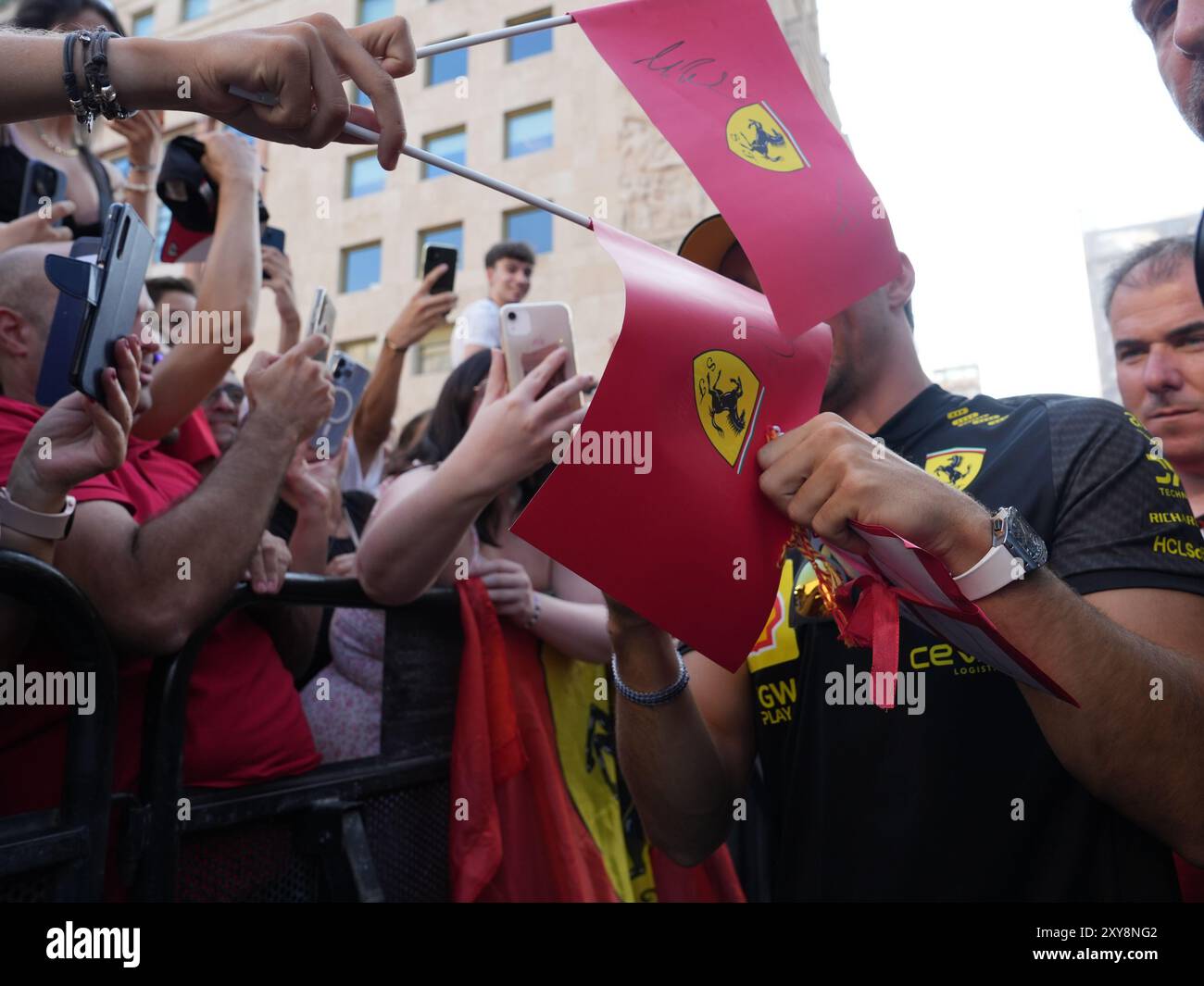 Milan - Ferrari fans storm the arrival of drivers Charles Leclerc and ...
