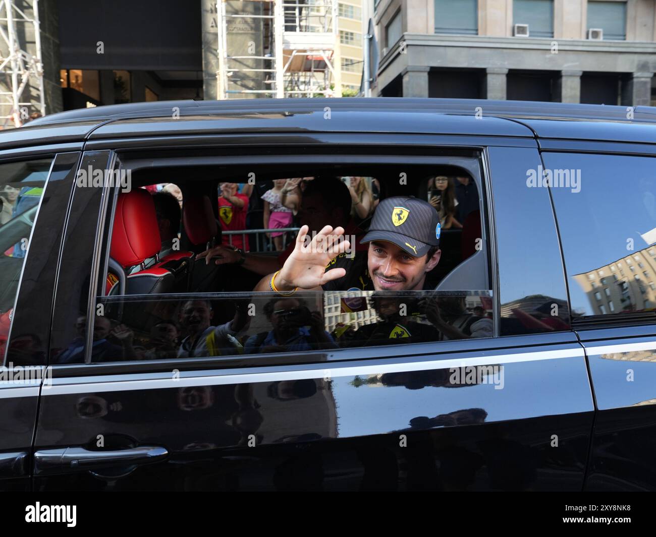 Milan - Ferrari fans storm the arrival of drivers Charles Leclerc and ...