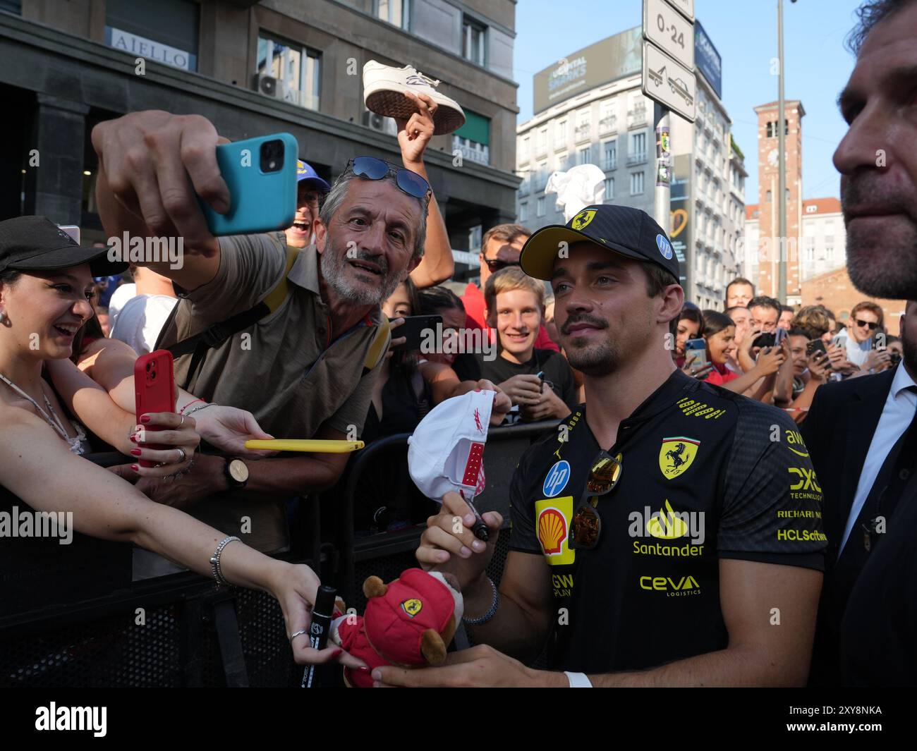 Milan - Ferrari fans storm the arrival of drivers Charles Leclerc and ...