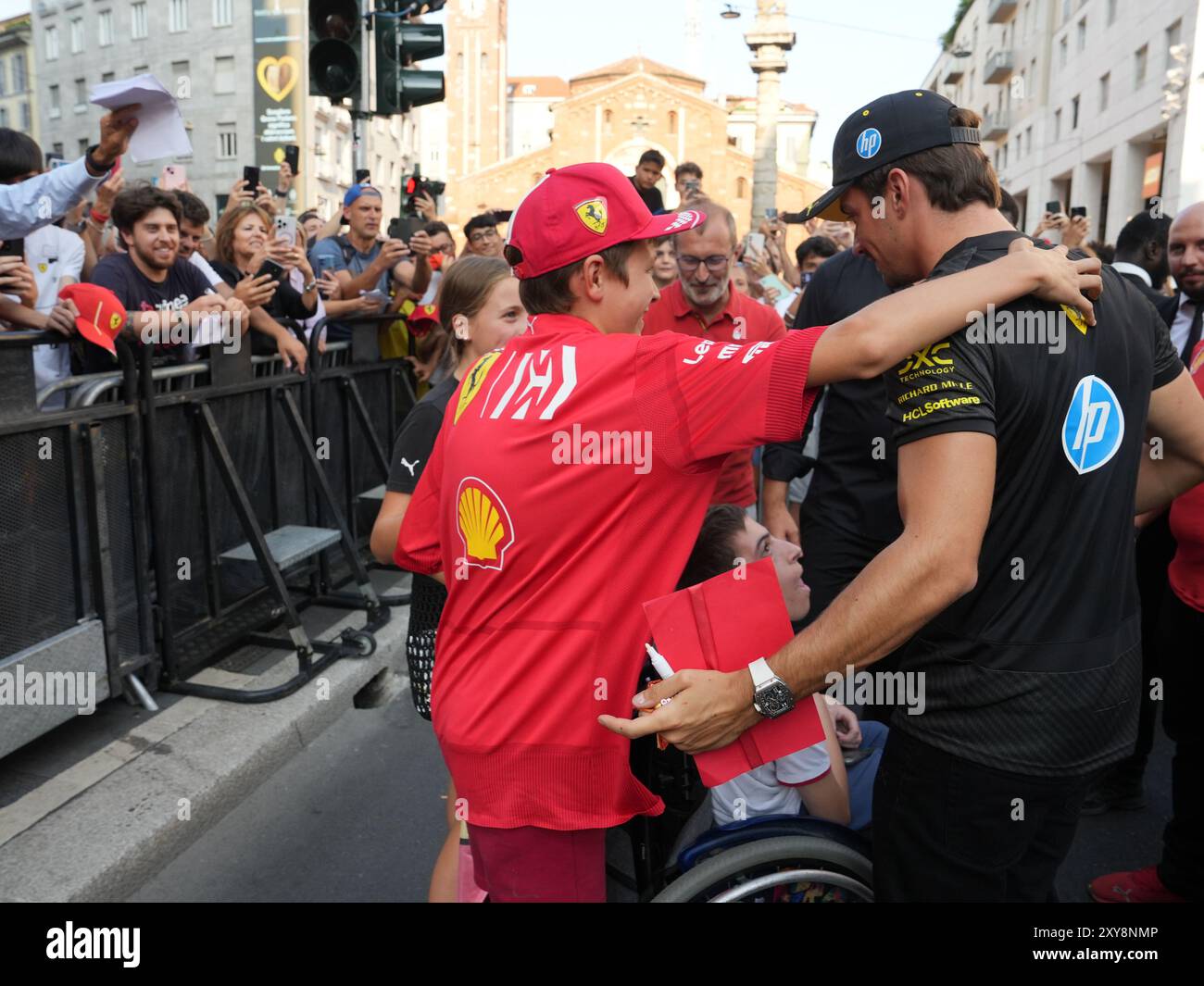 Milan - Ferrari fans storm the arrival of drivers Charles Leclerc and ...