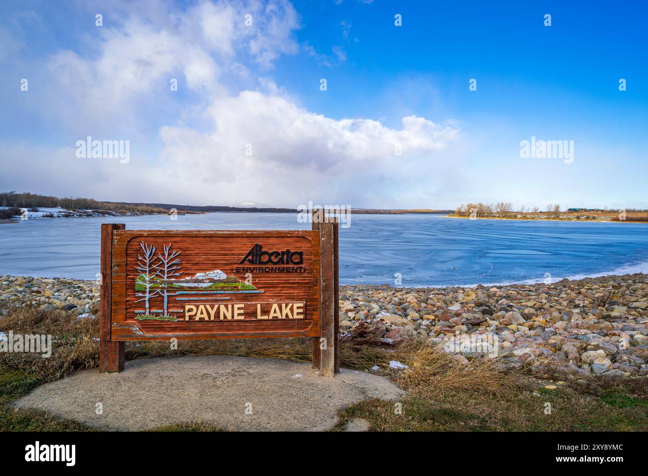 The surface of the Payne Lake reservoir in southern Alberta is frozen ...