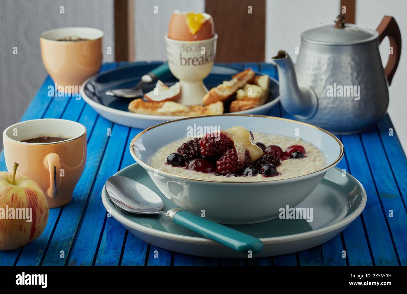Breakfast table set with food and beverages Stock Photo - Alamy