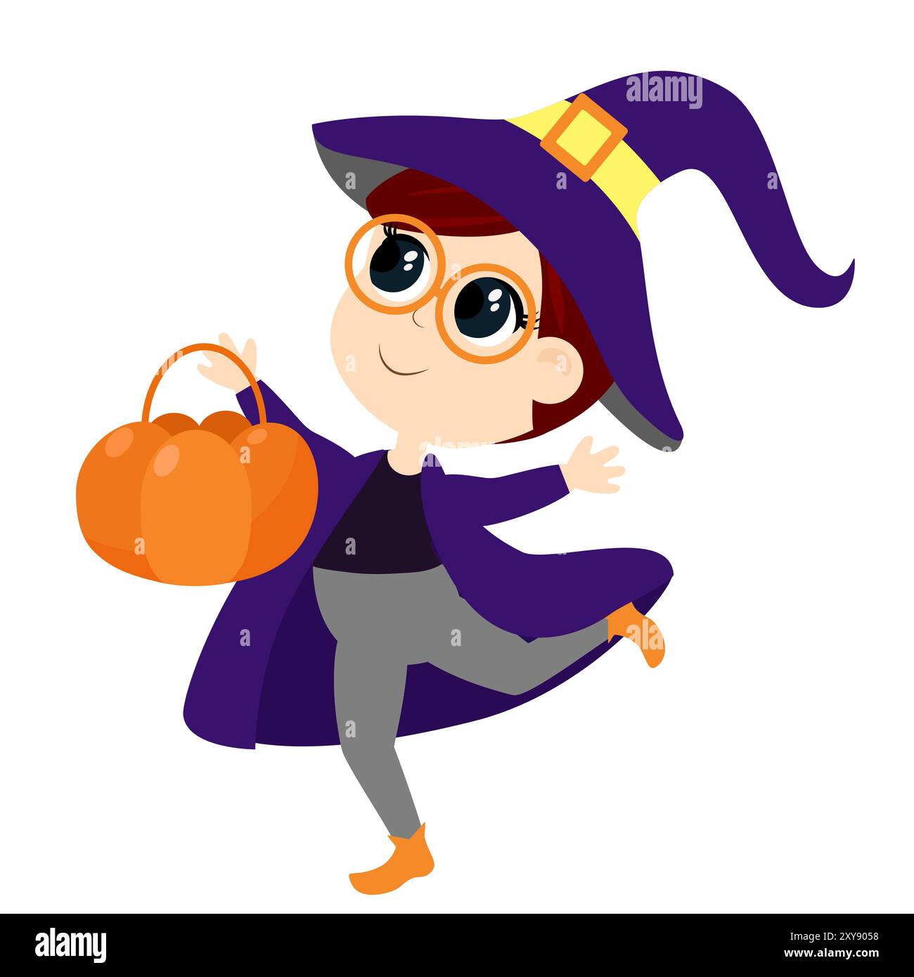 A child in a wizard costume and a hat runs with a candy basket ...