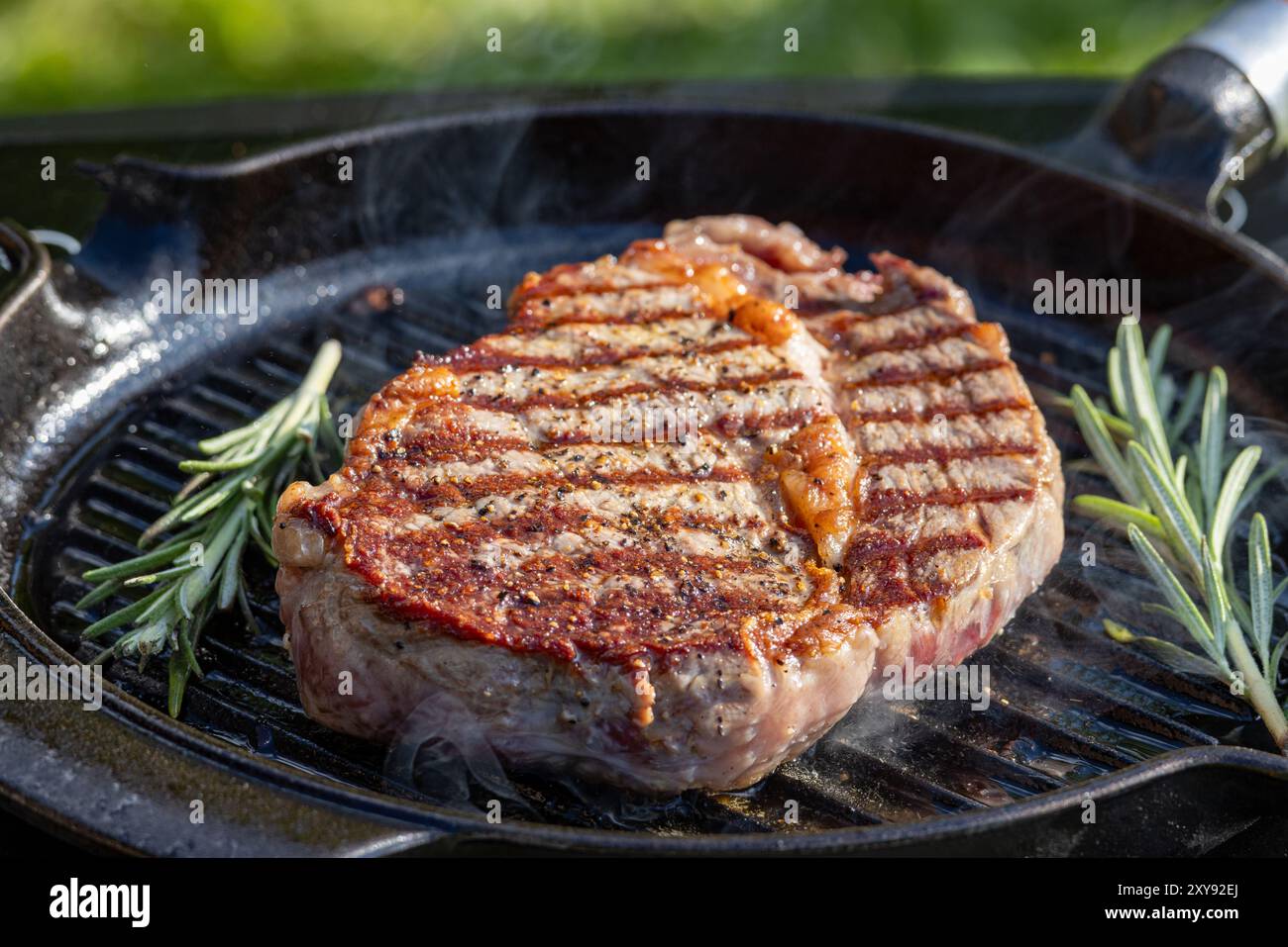 Delicious beefsteak on pan hi-res stock photography and images - Alamy