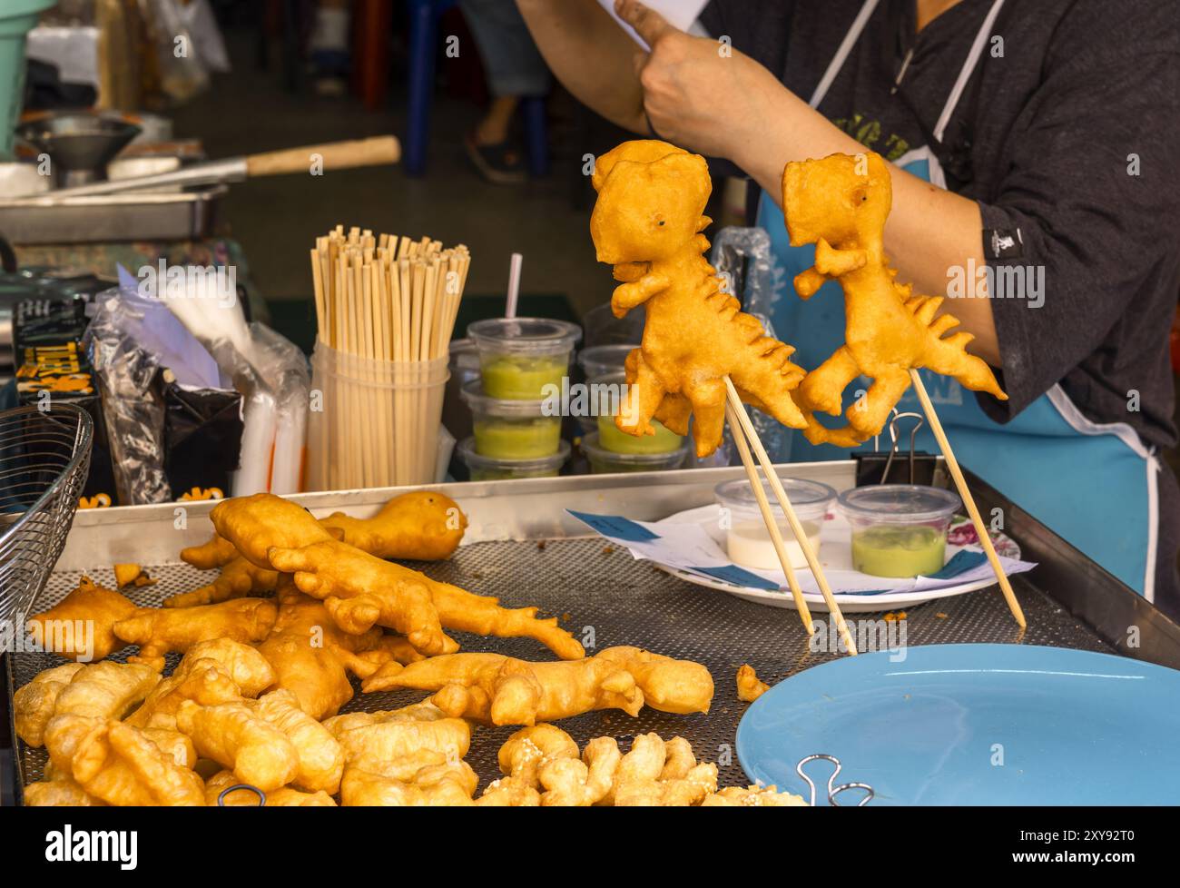 making chinese dragon donut in chiang mai, thailand Stock Photo - Alamy