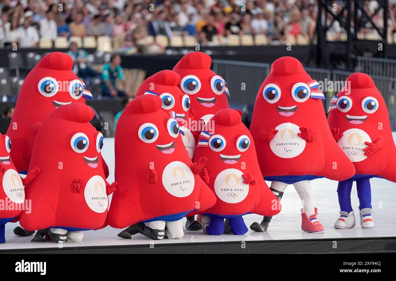 Performers dressed as the 2024 Paris Paralympic Games mascot Phryge on ...