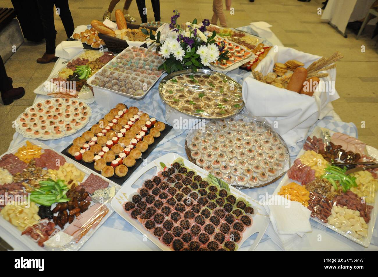 The Assortment of snacks on the buffet table. Various light snacks ...