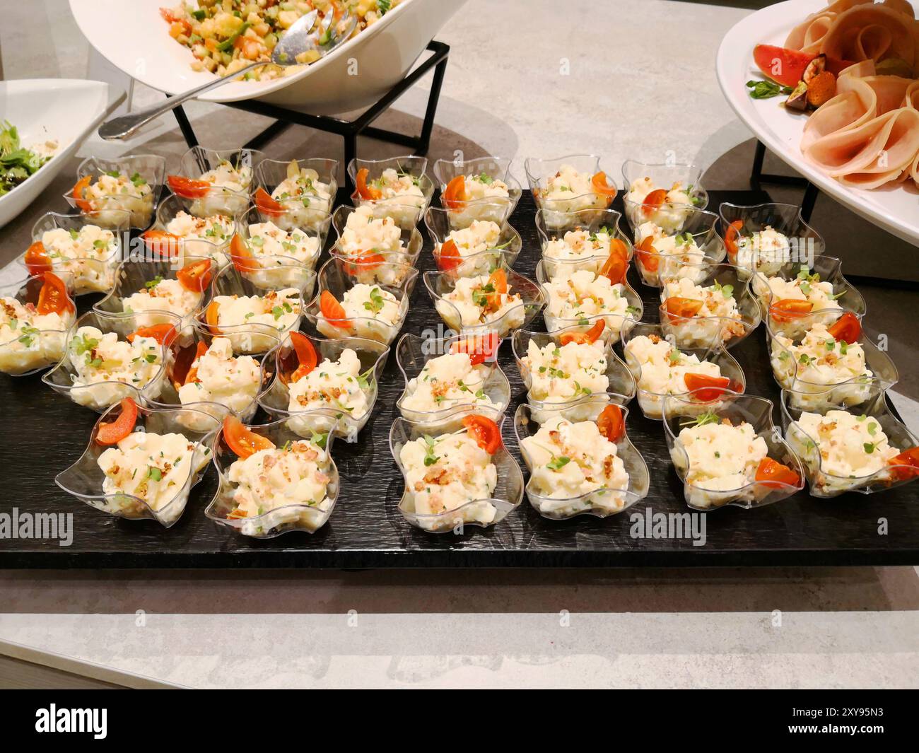 The Assortment of snacks on the buffet table. Various light snacks ...