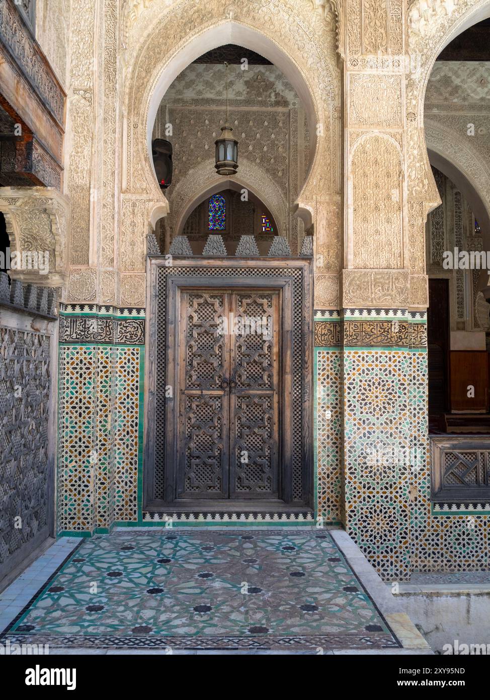 Bou Inania Madrasa courtyard decor with zelij and islamic stucco, Fez ...