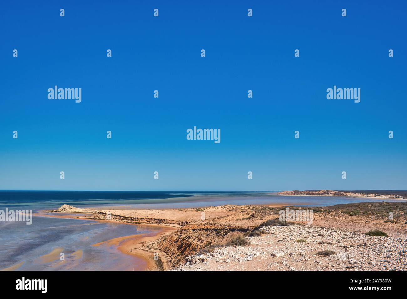 Aerial of the shallow coast with stunted outback vegetation and ...
