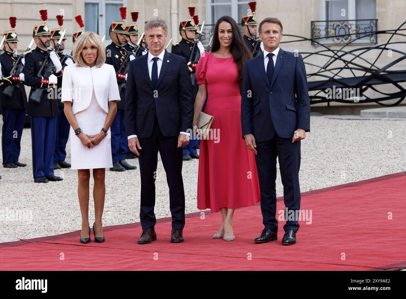 Paris, France. 28th Aug, 2024. French President Emmanuel Macron and his ...