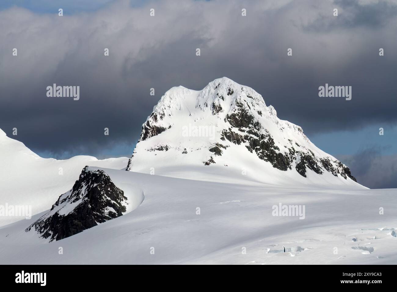 View of snow-covered Livingston Island viewed from Half Moon Island in ...