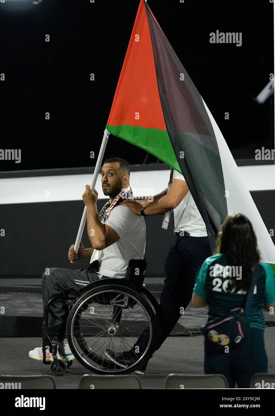 Palestine's flag bearer Fadi Aldeeb during the opening ceremony of the ...