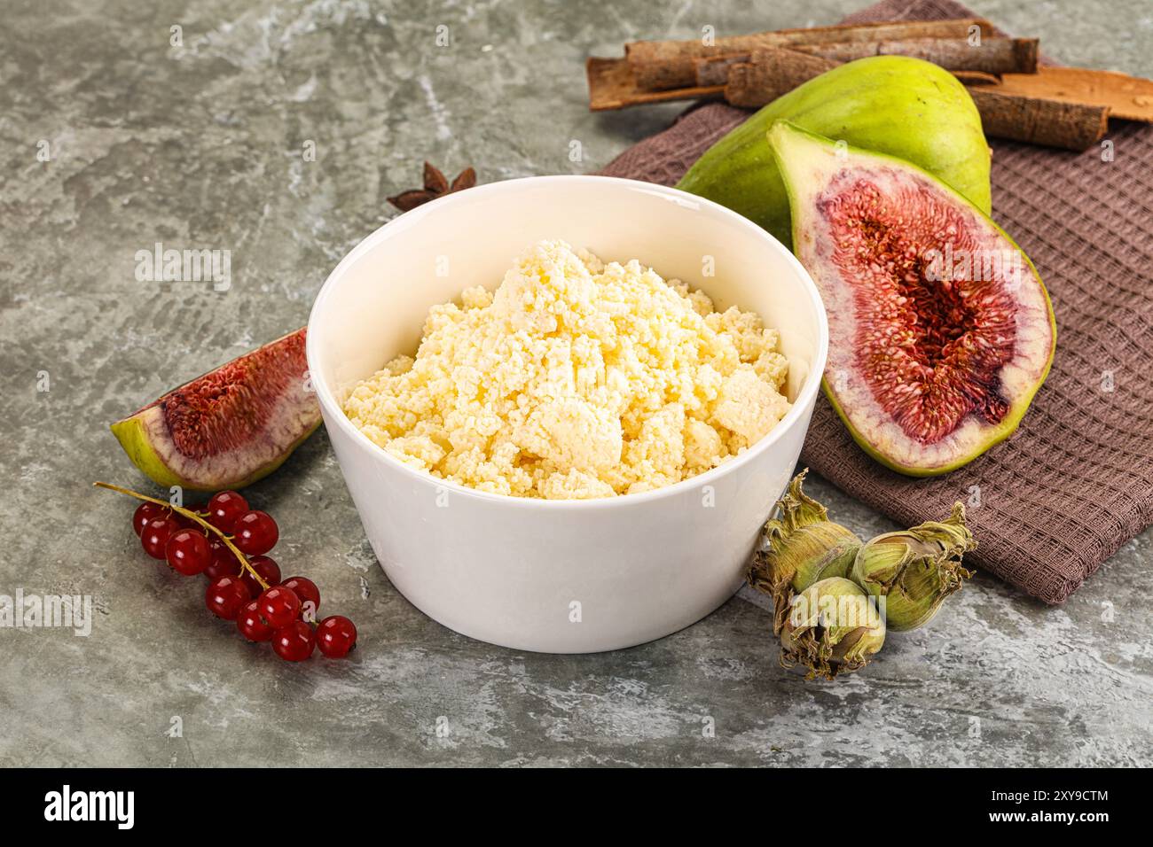 Delicous sheep cottage cheese curd served fig Stock Photo - Alamy