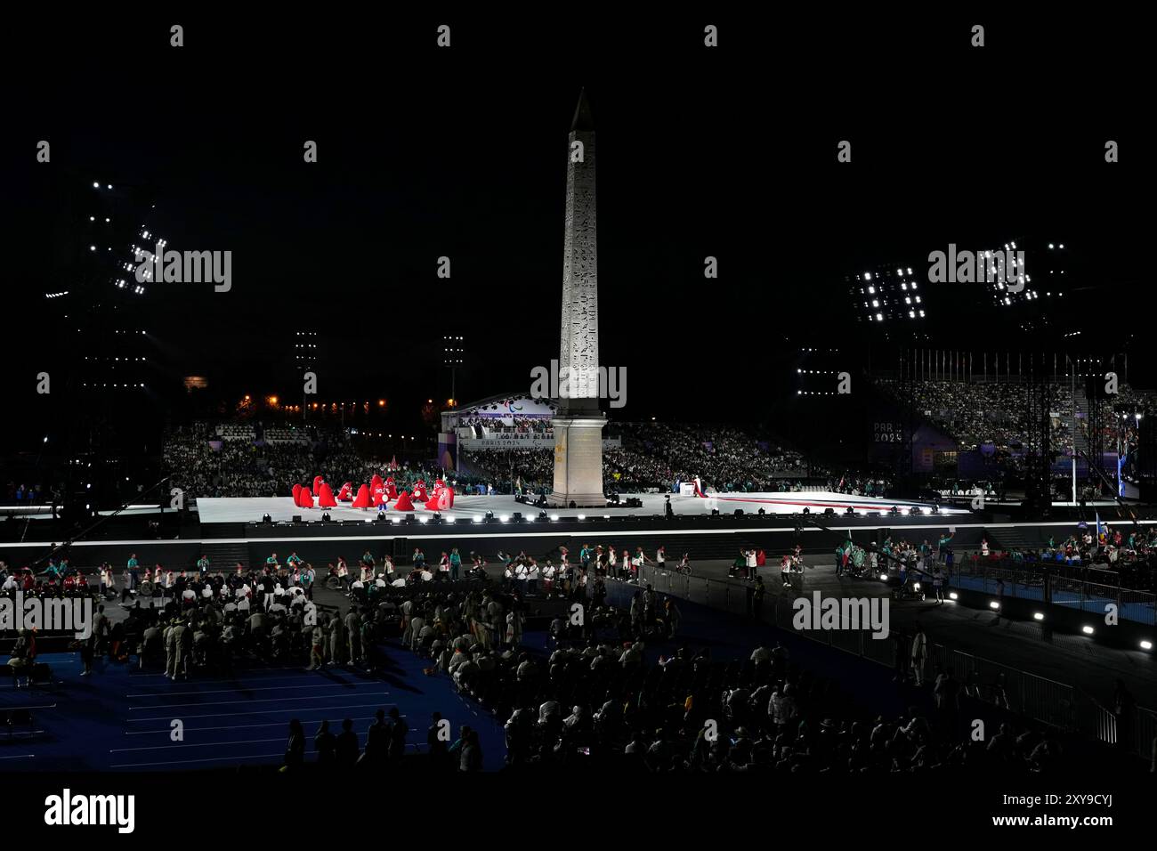 The Phryges, the Paris Games' mascots, stand on stage while the ...